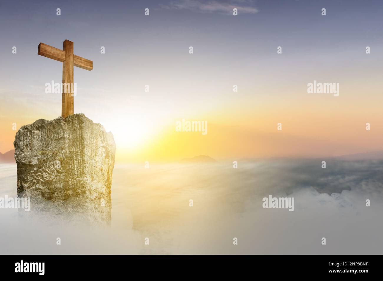 Christian Cross on the rock hill with sunset sky background Stock Photo ...