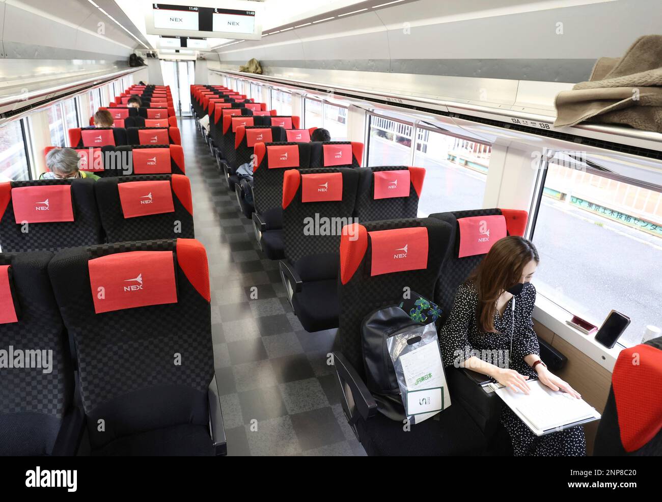 Limited express train "Narita Express" (NEX) is used as a telework ...