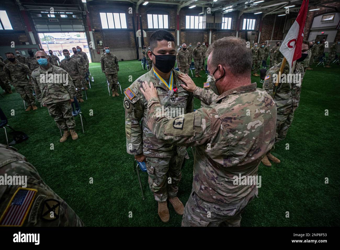U.S. Army Capt. London Nagai is awarded the Bronze Star Medal by Lt ...