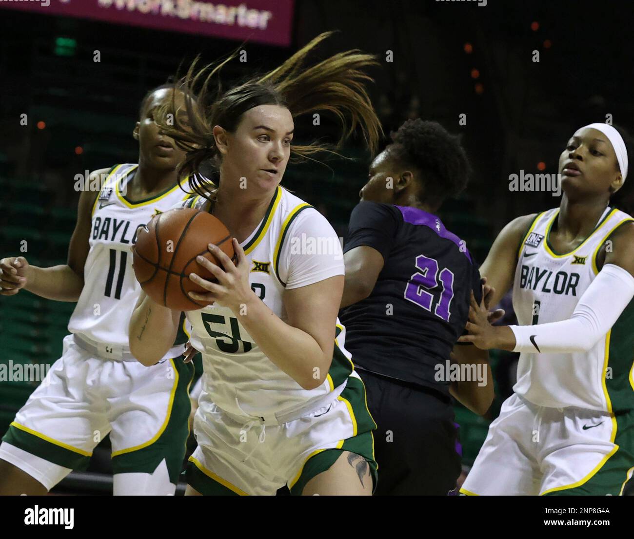 Baylor forward Caitlin Bickle grabs a rebound next to Central Arkansas ...