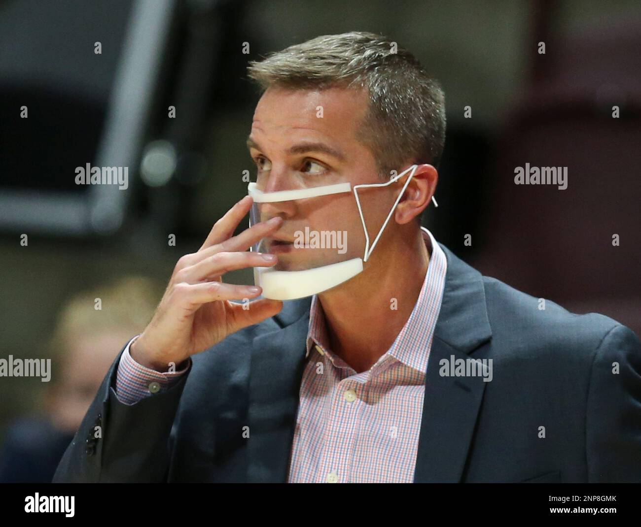 Richmond head coach Aaron Roussell looks towards the scoreboard during ...