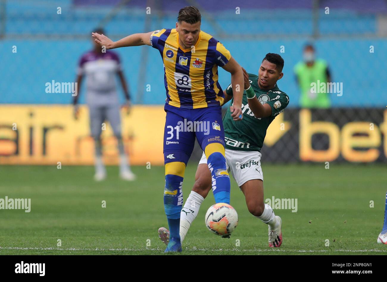 Carlos Rodriguez of Ecuador's Delfin, left, and Rony of Brazil's ...