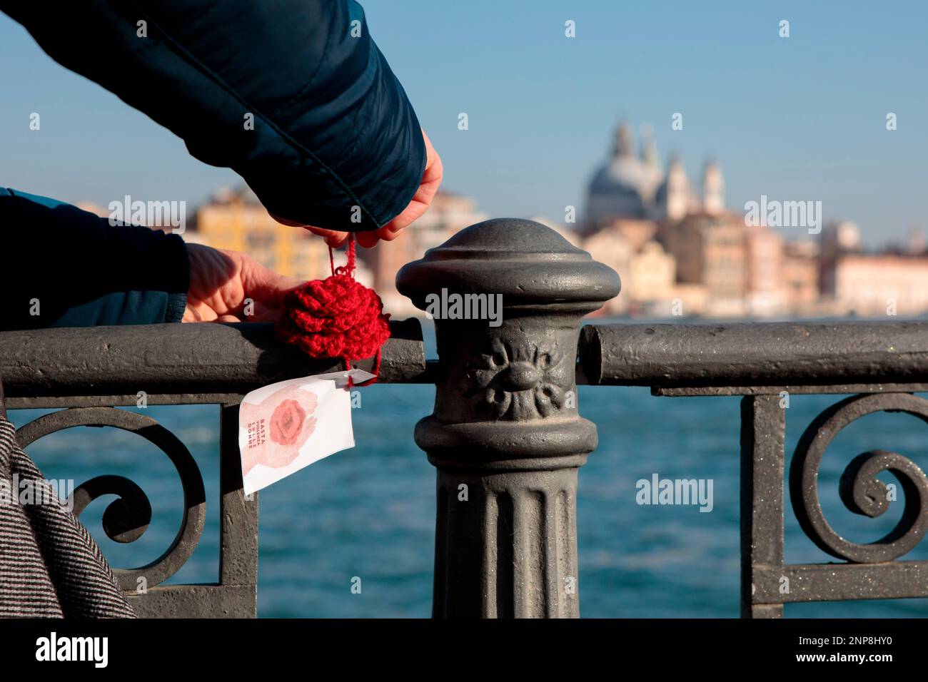 A crocheted roses placed as a symbol of protest against violence on ...