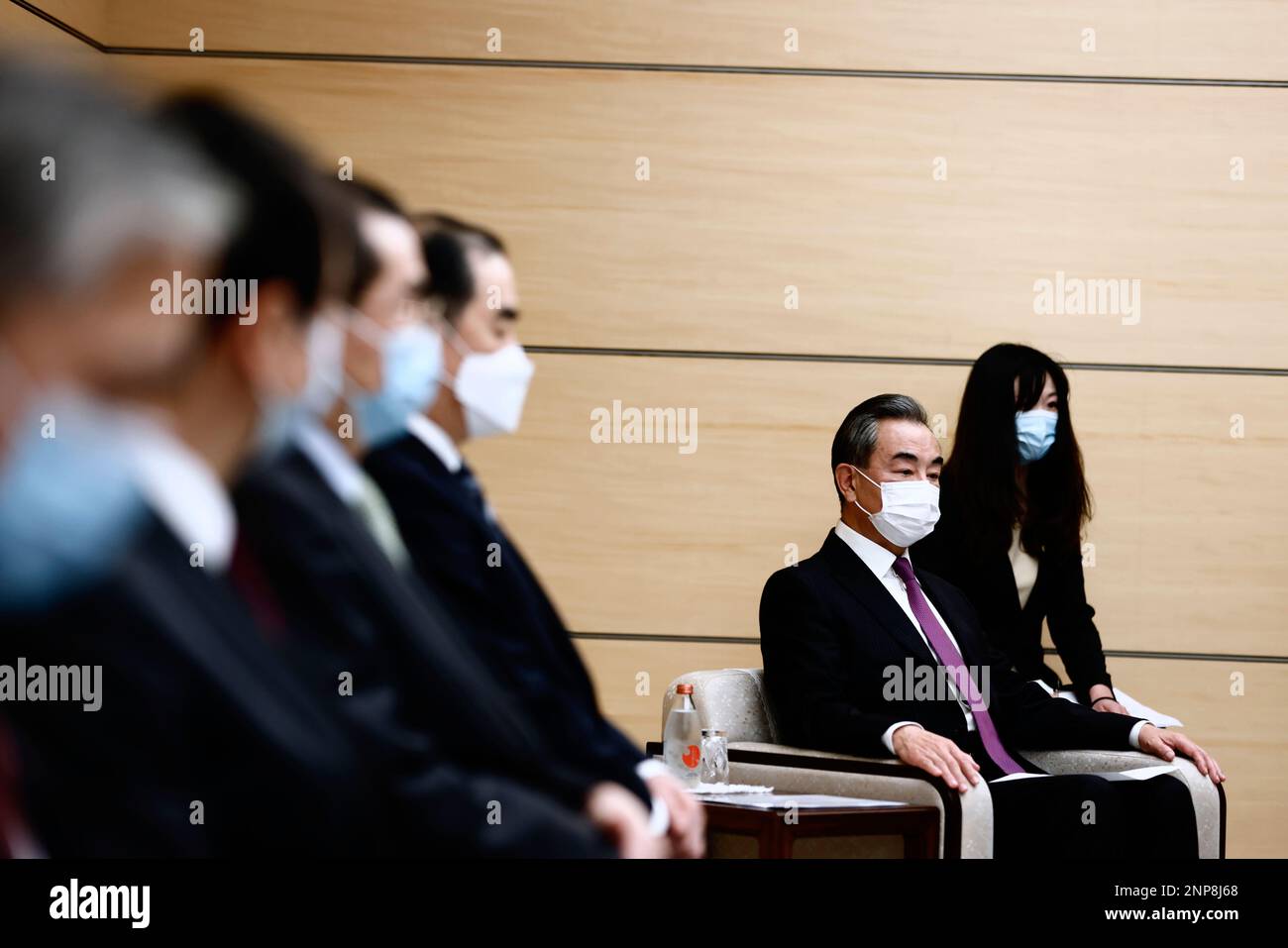 China's Foreign Minister Wang Y, second right, waits to meet with Japan ...