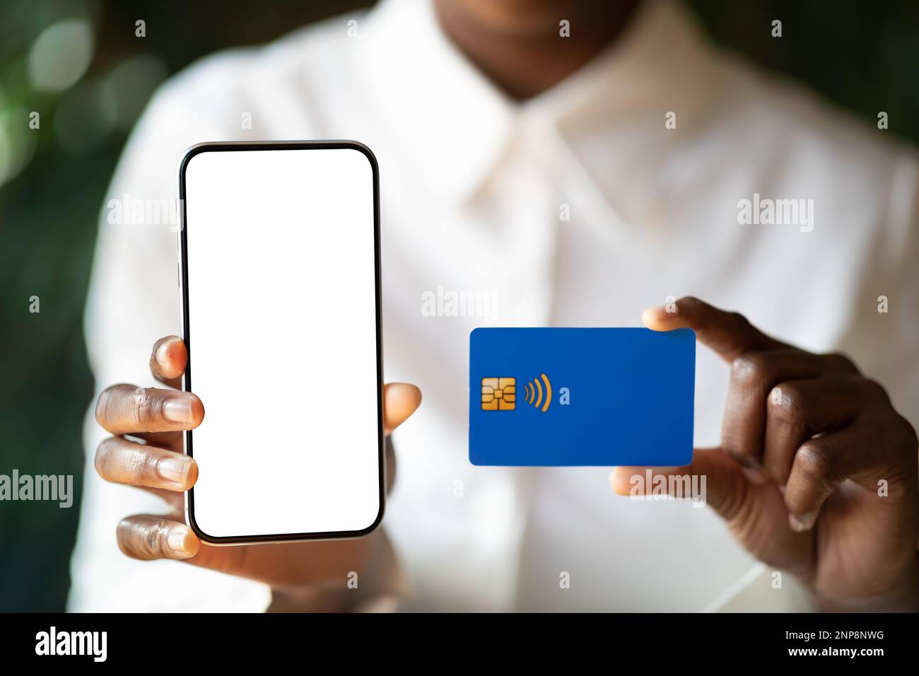 Entrepreneur holding smartphone bank card hi-res stock photography and ...