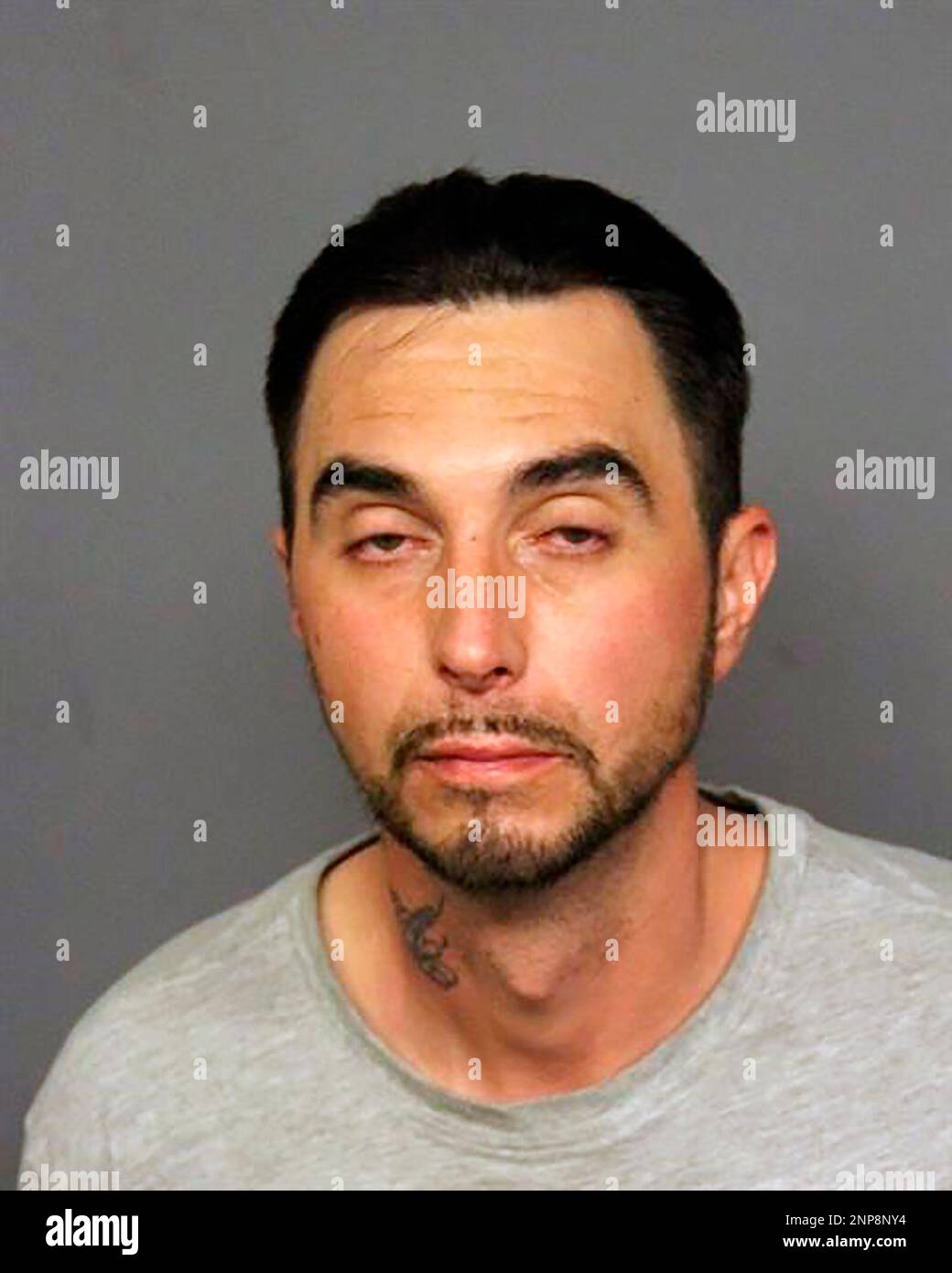 This booking photo provided by the Denver Police Department shows ...
