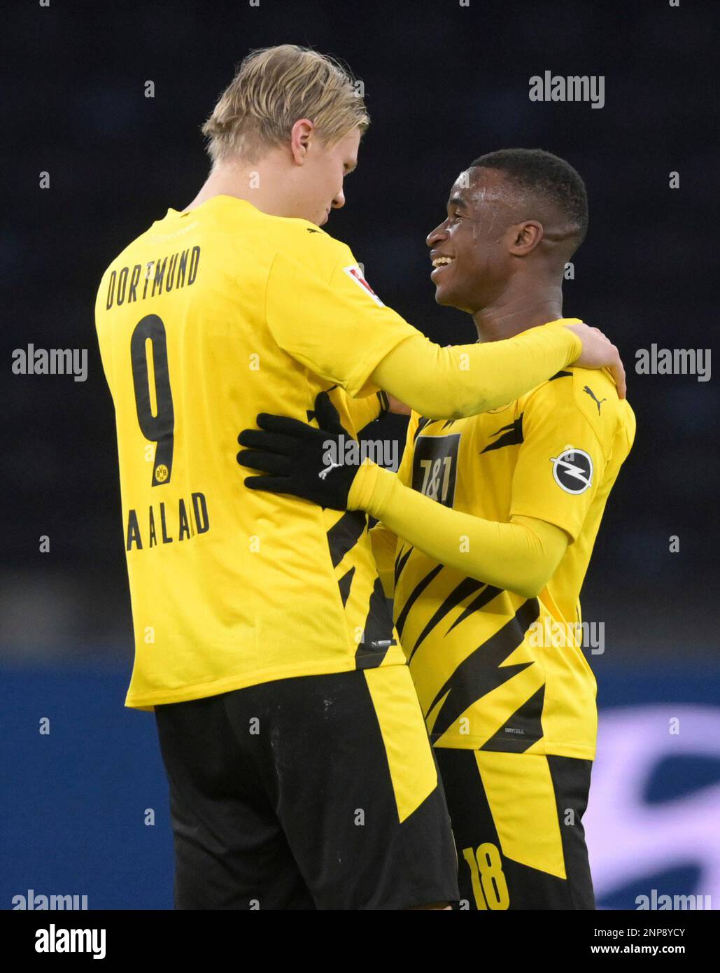 Dortmund's Erling Haaland (l) and Youssoufa Moukoko hug each other ...