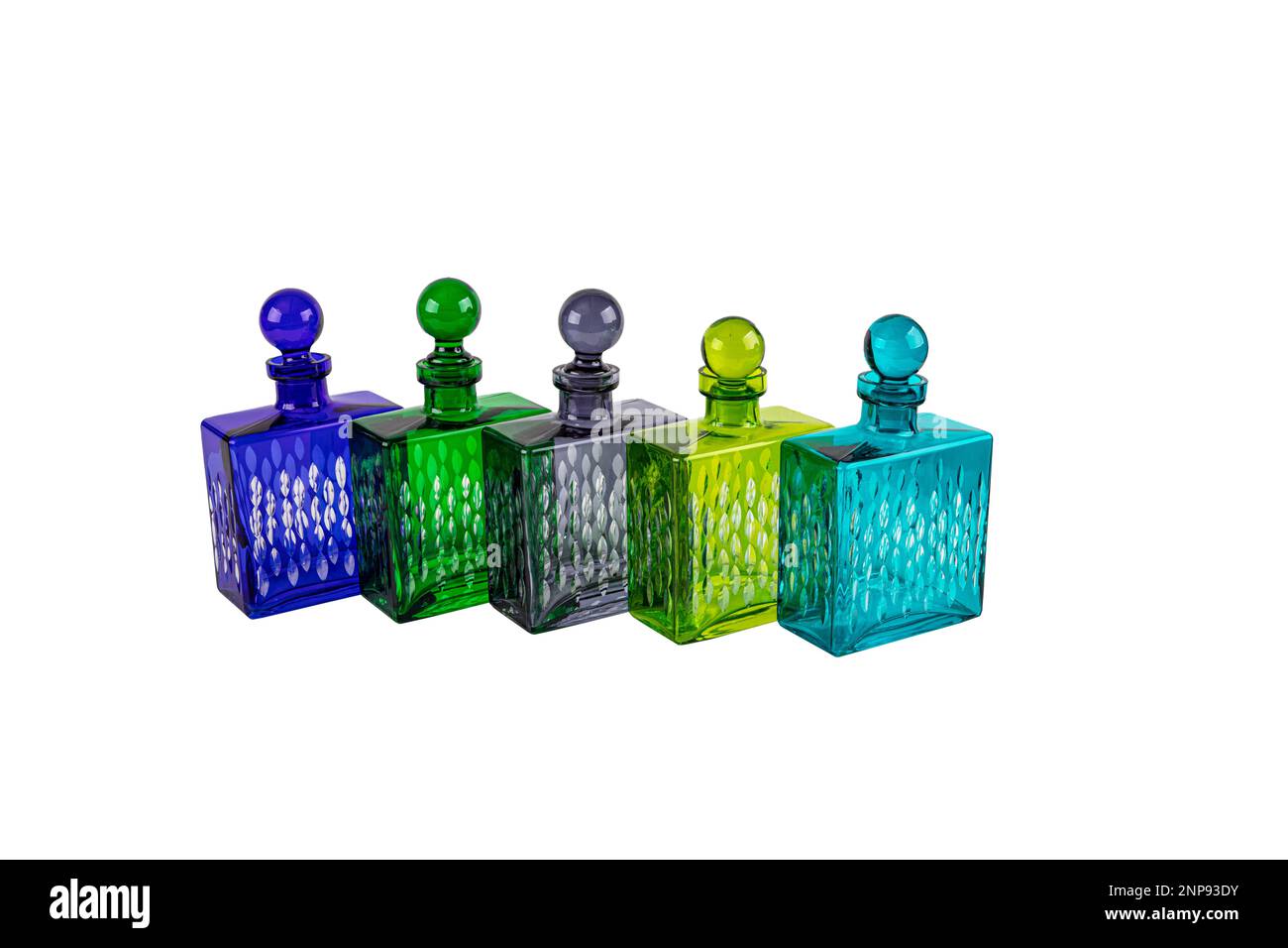 Colorful crystal glass Whiskey bottle. Glass bottles isolated on white ... Colorful crystal glass Whiskey bottle. Glass bottles isolated on white ...