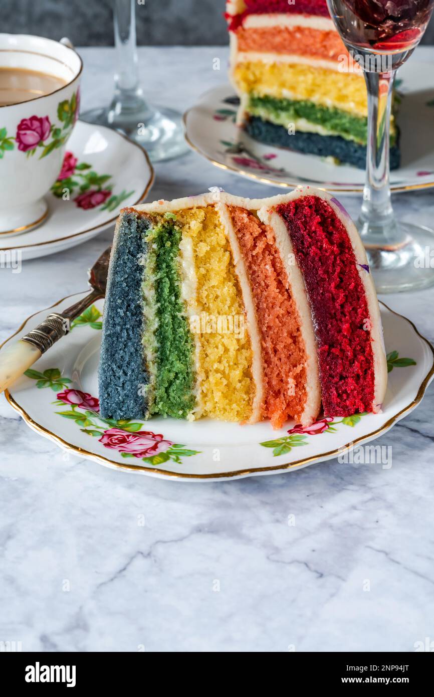 Multi layered rainbow cake - sweet afternoon dessert Stock Photo - Alamy
