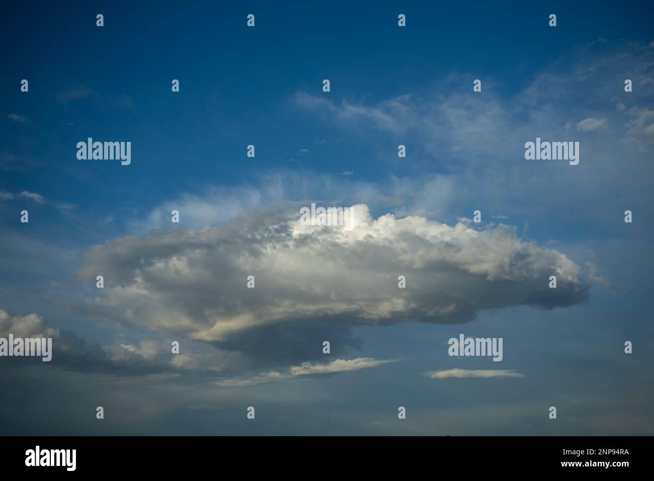 Intense blue sky with fluffy white and greyish storm clouds in the ...