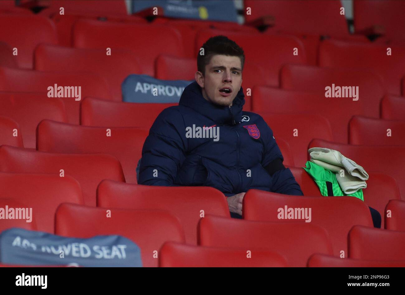 England's goalkeeper Nick Pope sits in the stands before the UEFA ...