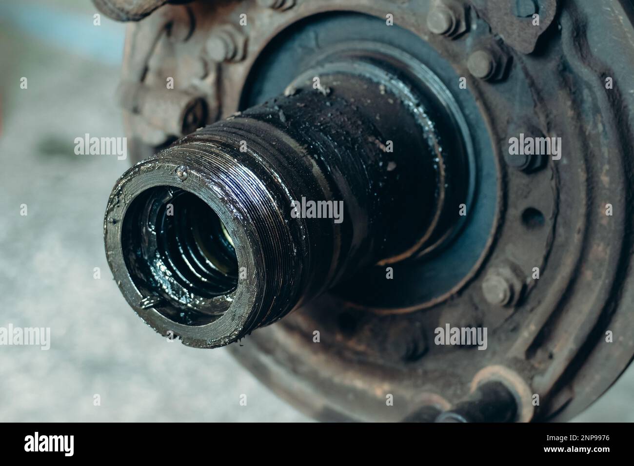 Repair of car brake discs. Hub and brake discs with pads in close-up ...