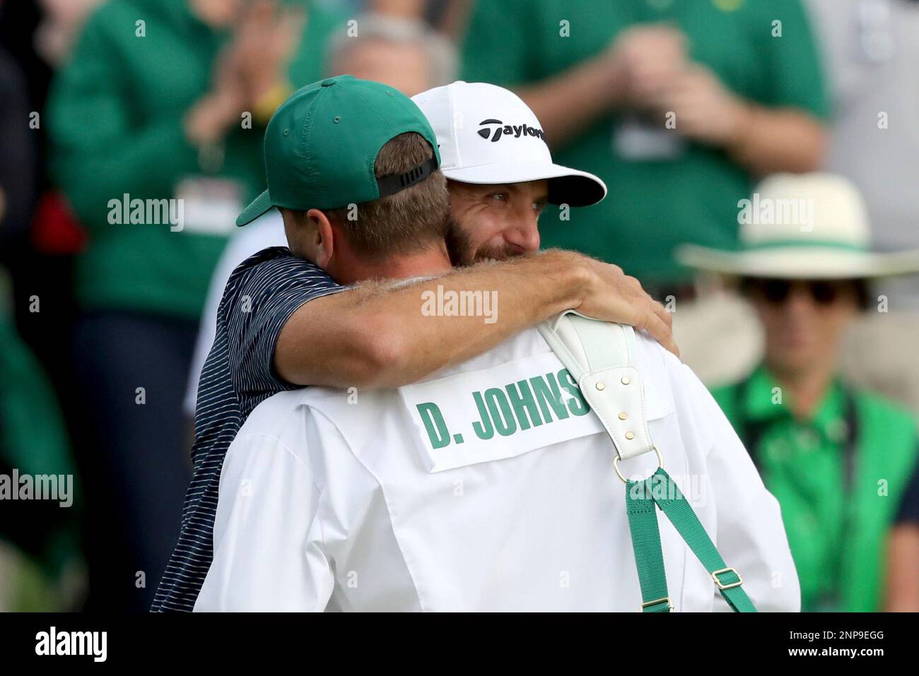 Dustin Johnson reacts with his brother and caddie Austin Johnson on the ...