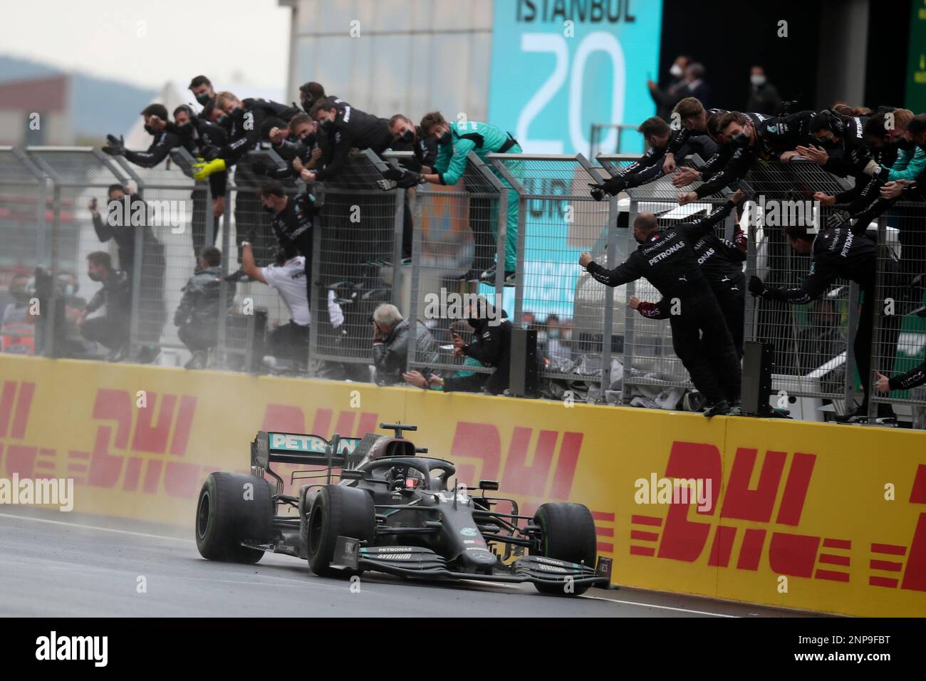 Mercedes driver Lewis Hamilton of Britain crosses the finish line to ...