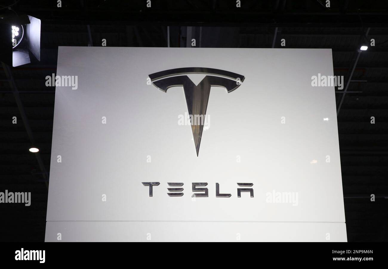 A photo shows a logo of Tesla, Inc. in Shanghai, China on November 6 ...