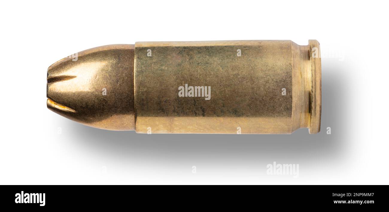 Shadow behind a 9 mm cartridge that has a hollow point bullet for ...