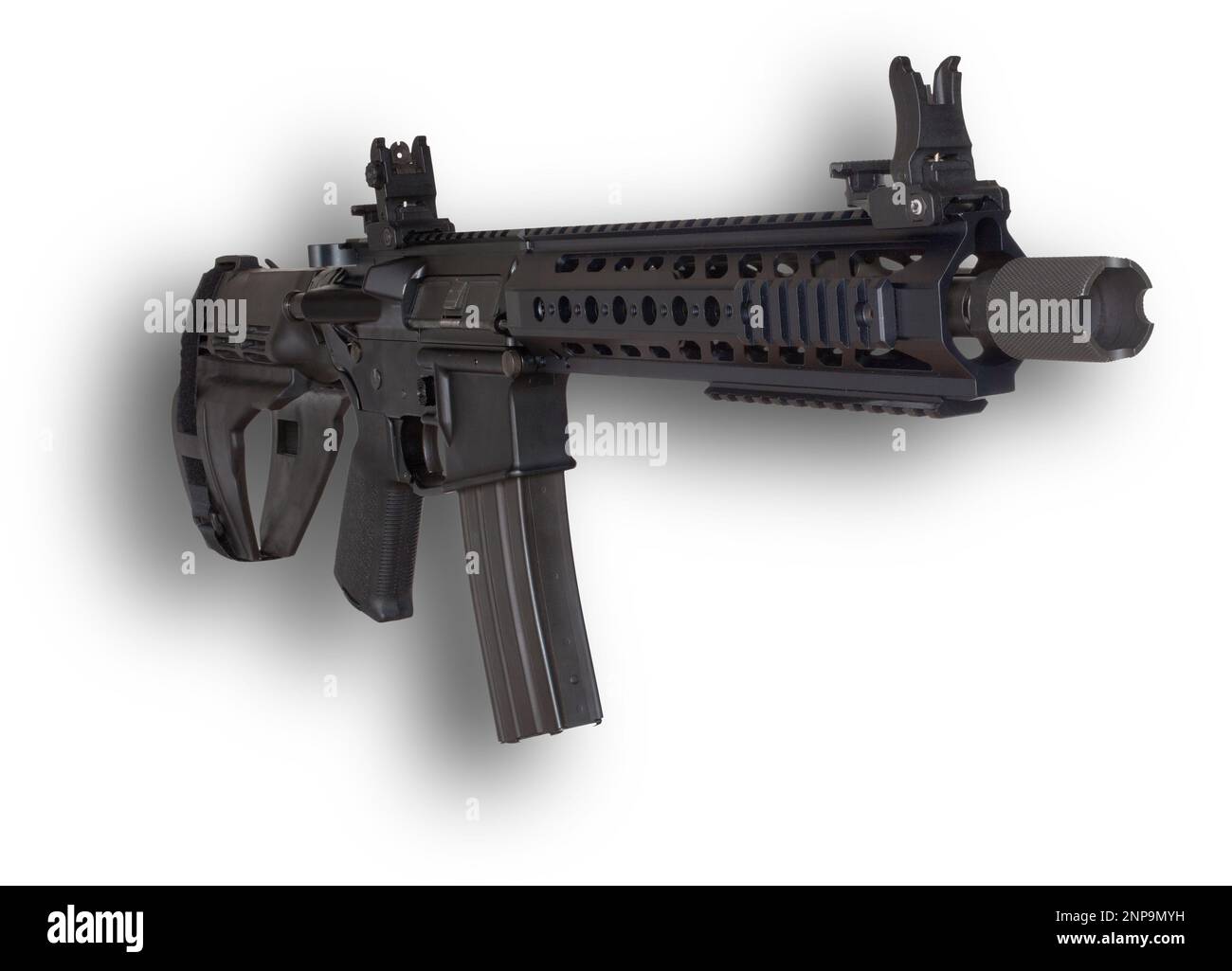 Shadow behind an AR-15 with a pistol brace and magazine inserted ready ...