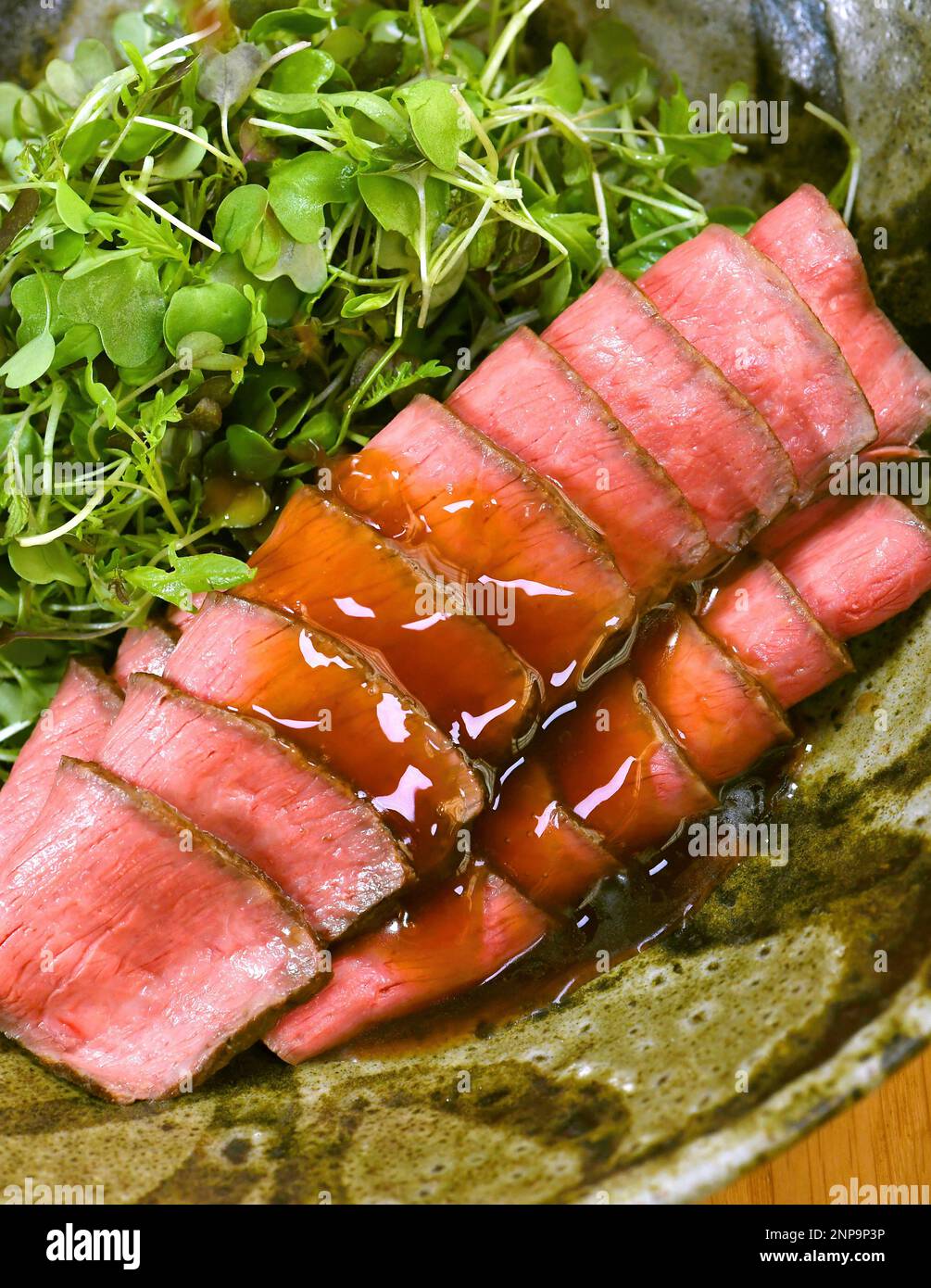 A picture taken on Nov. 13, 2020 shows a plate of roast beef in Tokyo ...