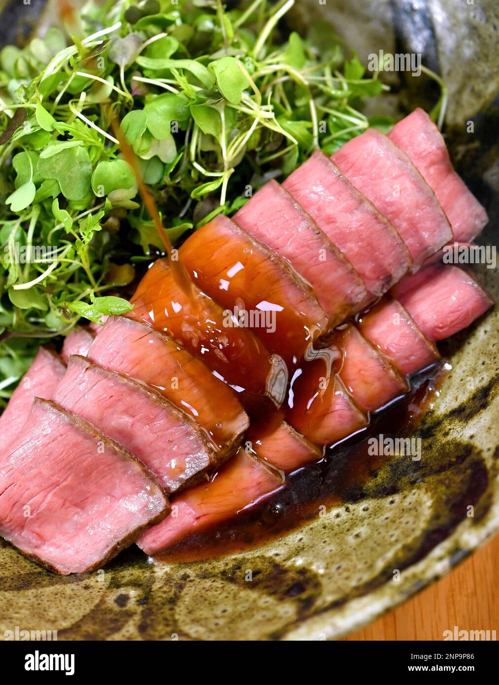 A picture taken on Nov. 13, 2020 shows a plate of roast beef in Tokyo ...