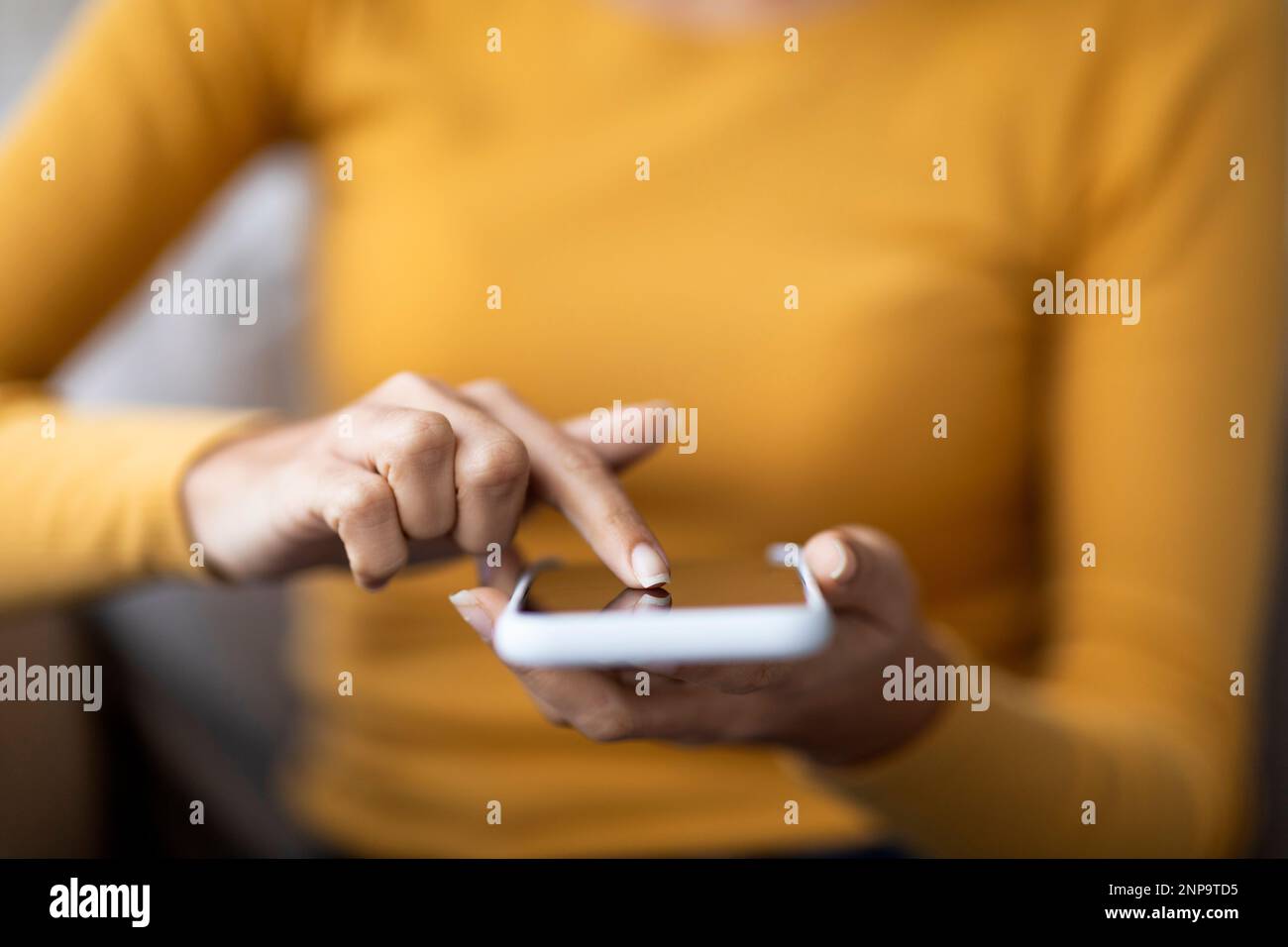 Unrecognizable Female Touching Screen Of Modern Smartphone With Finger ...