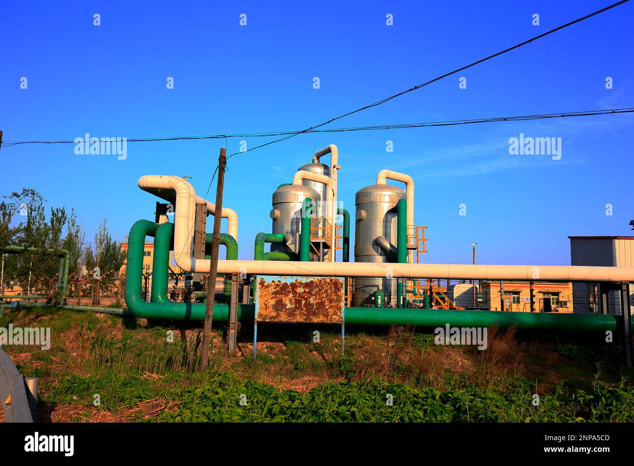 Oil pipes and valves Stock Photo - Alamy