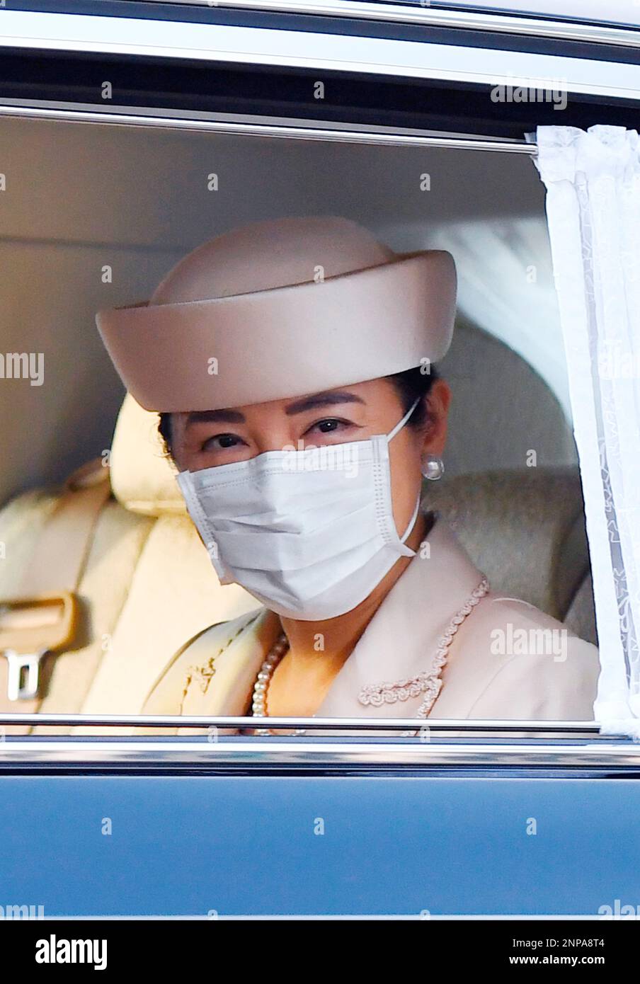 Japan's Empress Masako enters the Imperial Palace in Tokyo on November ...