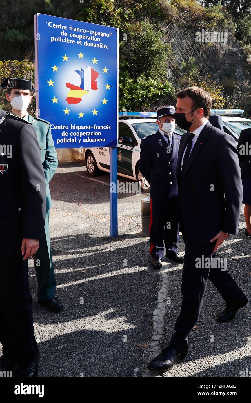 French President Emmanuel Macron, right, arrives at the French-Spanish ...