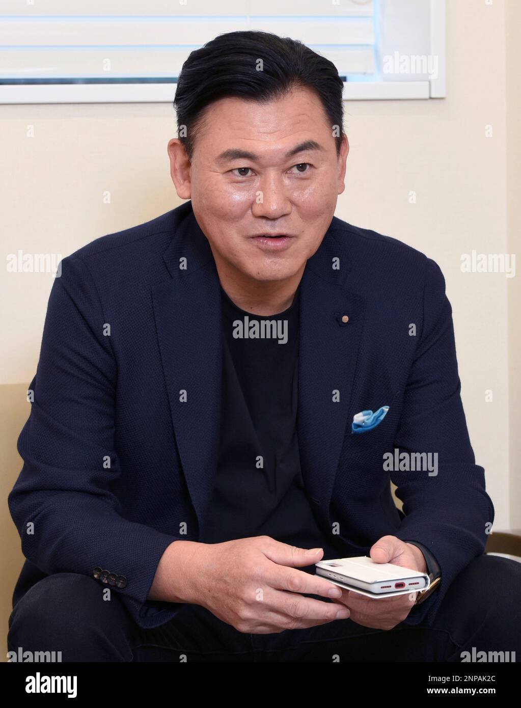 Hiroshi Mikitani, founder and CEO of Rakuten answers a quetion during ...