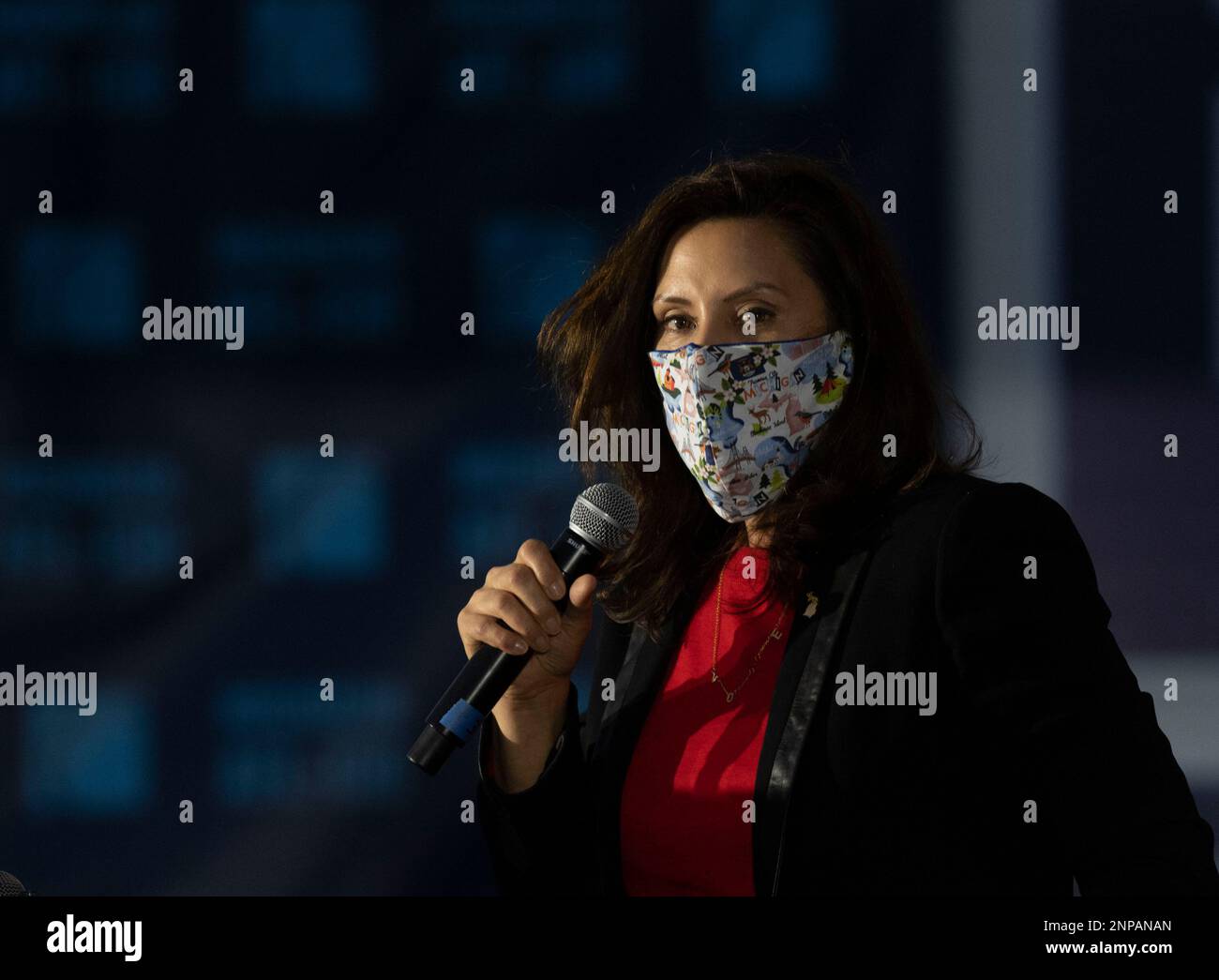 Gov. Gretchen Whitmer speaks before Doug Emhoff, who is the husband of ...