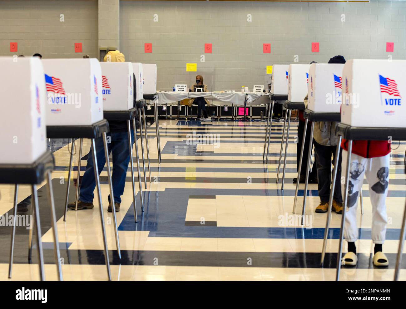 SILVER SPRING, MD - NOVEMBER 03: Voters stand at voting booths in Blake ...