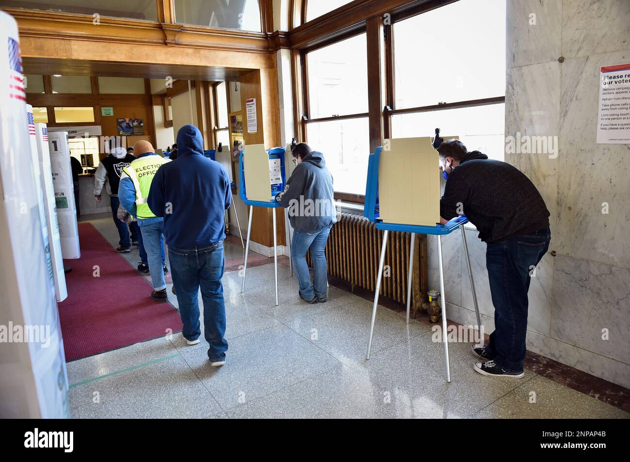 Voters cast their ballots at the Lewis and Clark County election ...