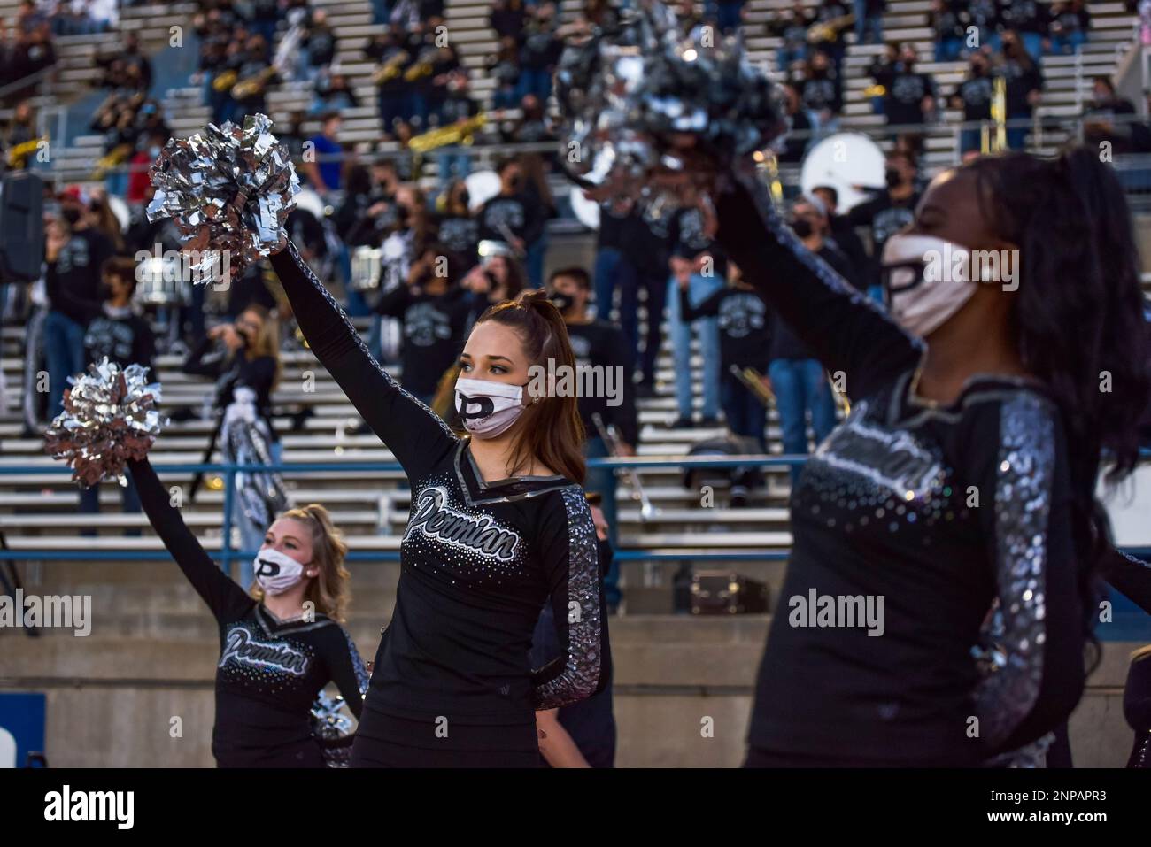 Faith Groves, center, performs a cheer routine with her fellow Panther ...