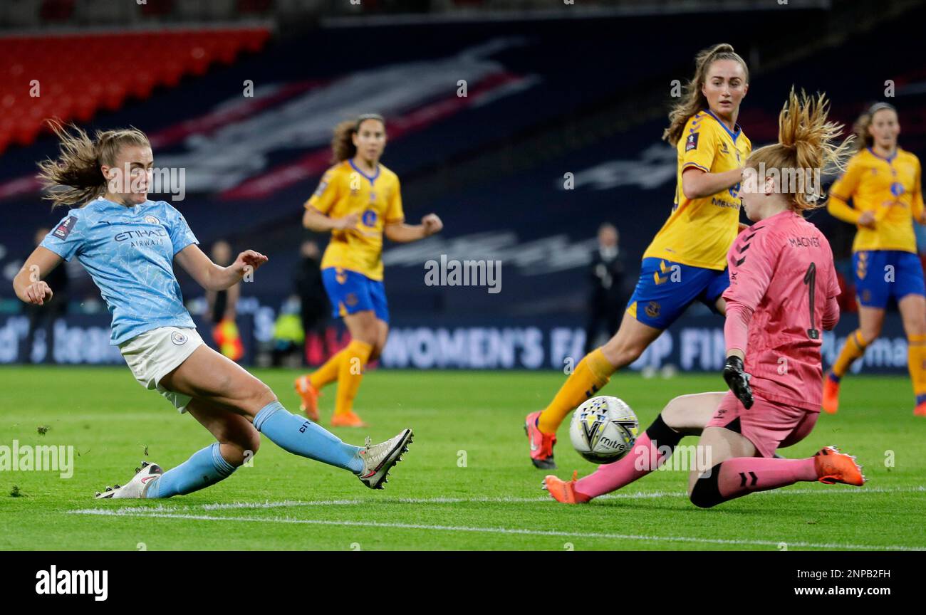 Manchester City's Georgia Stanway, left, scores her sides second goal ...