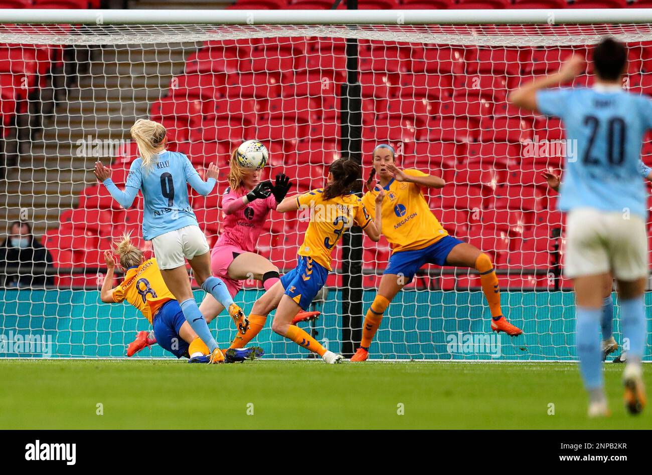 Everton's goalkeeper Alexandra MacIver, third left, makes a save in ...