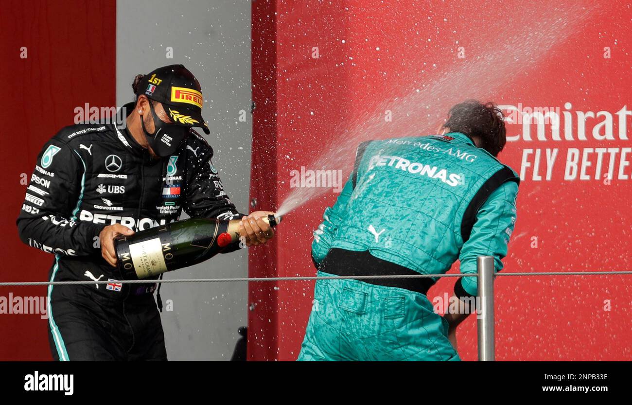 Winner, Mercedes driver Lewis Hamilton of Britain, left, celebrates ...