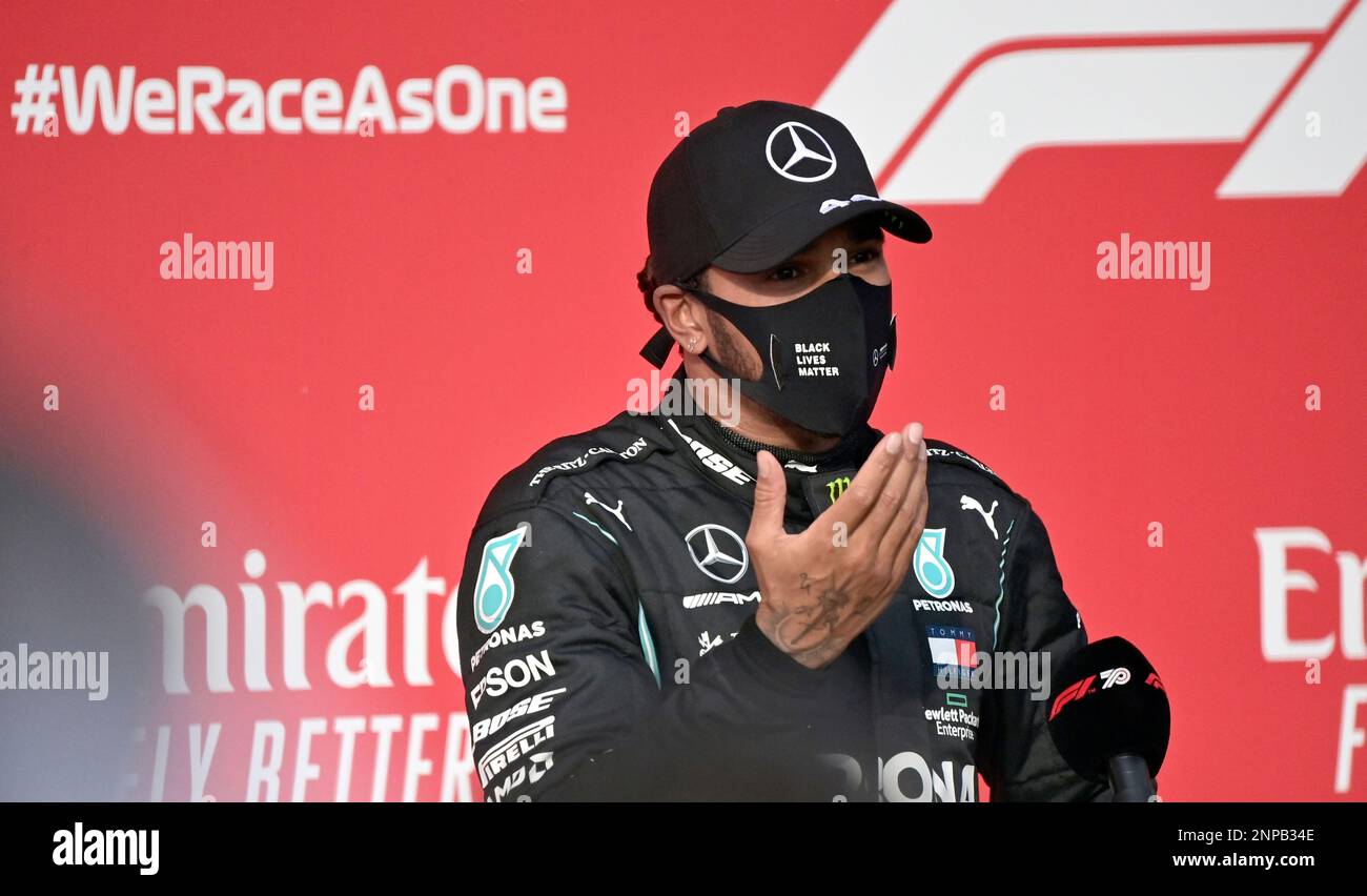 Mercedes driver Lewis Hamilton of Britain speaks with the media after ...
