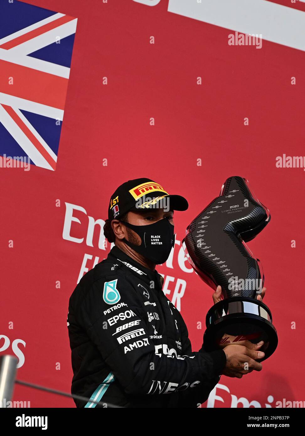 Winner, Mercedes driver Lewis Hamilton of Britain celebrates by holding ...