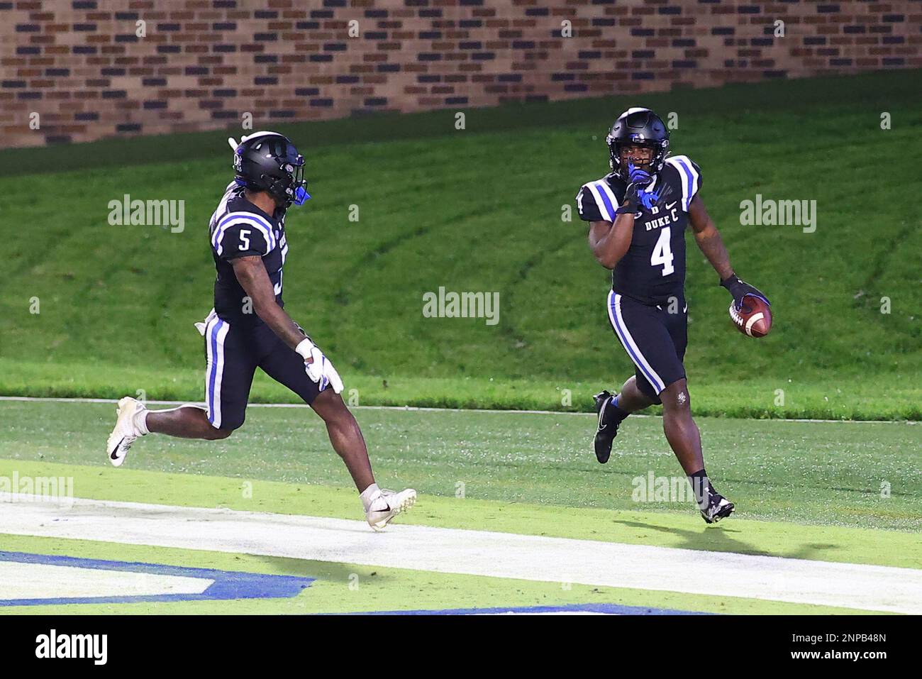 Duke running back Deon Jackson, right, celebrates a touchdown during ...