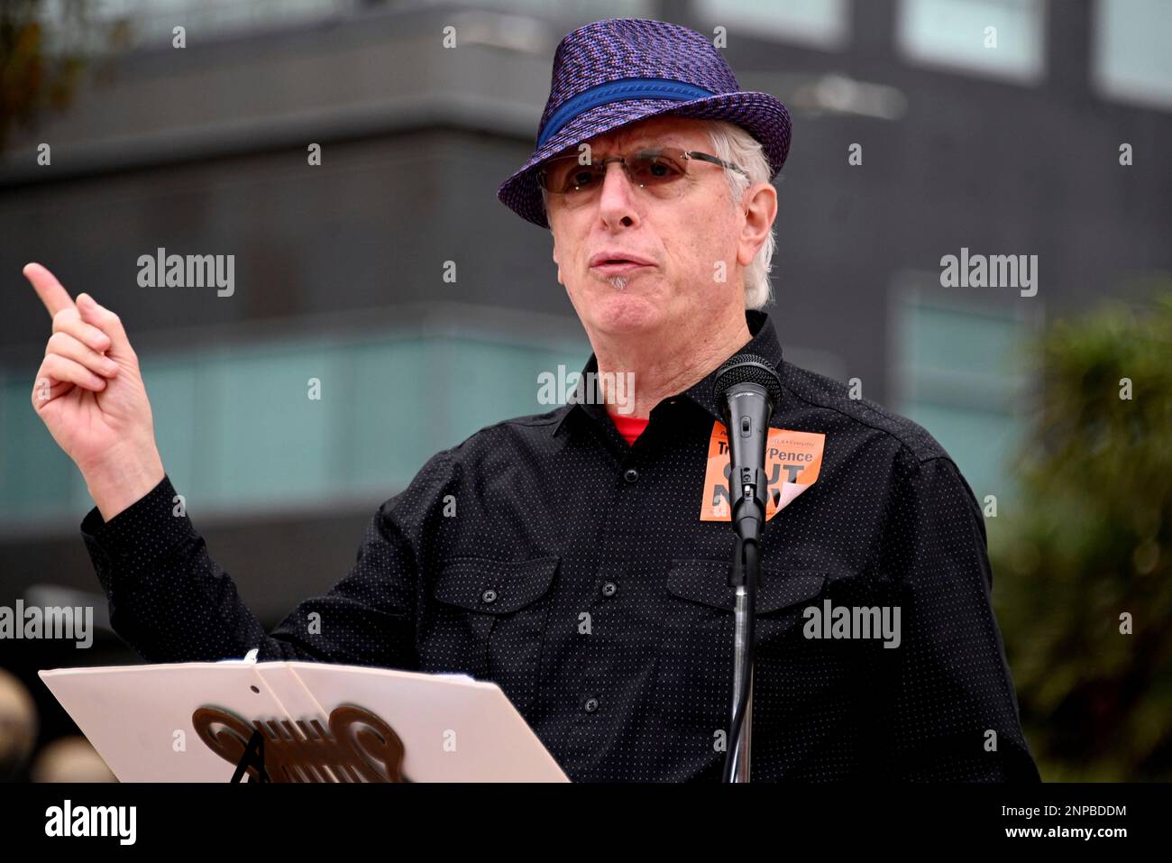 Andy Zee, co-initiator of RefuseFascism.org speaks during a ...