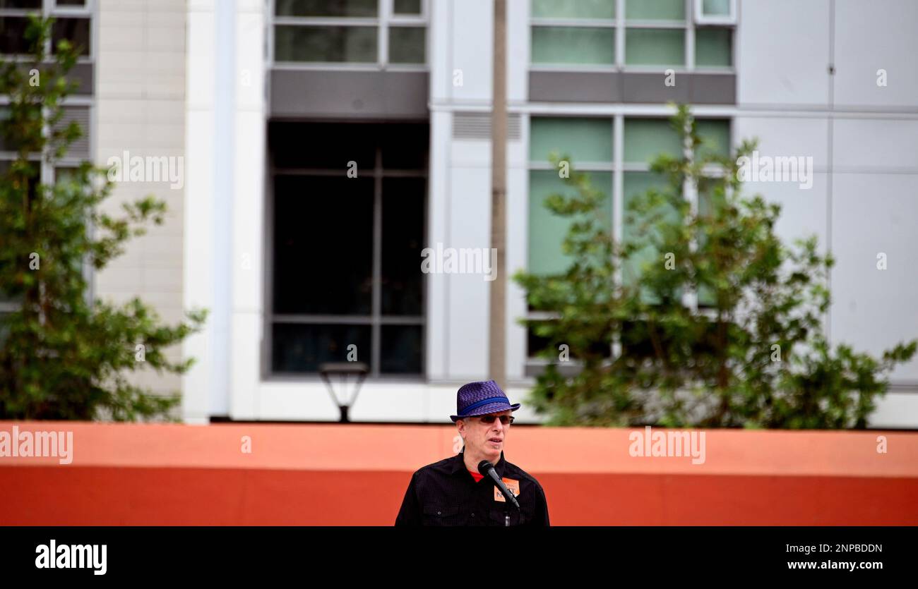 Andy Zee, co-initiator of RefuseFascism.org speaks during a ...