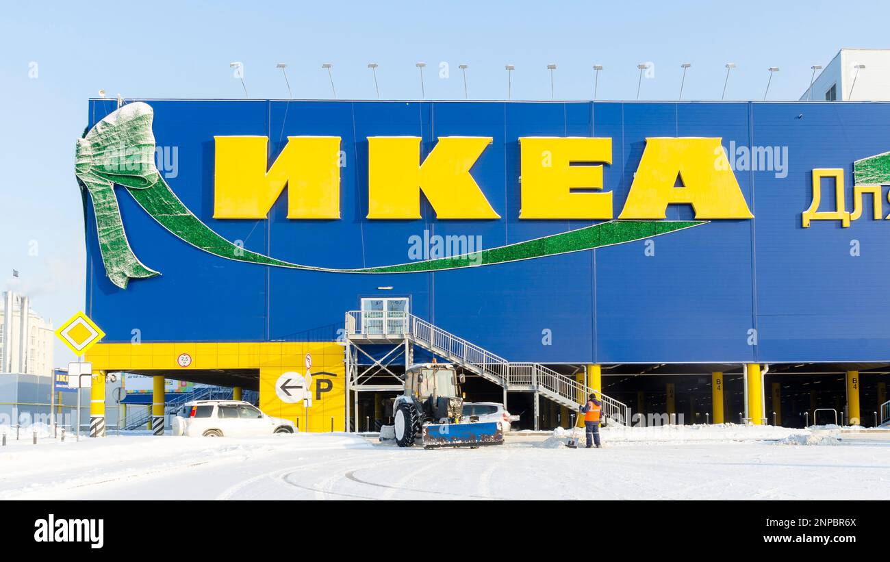 The inscription on the store "IKEA", with Christmas decorations next to ...