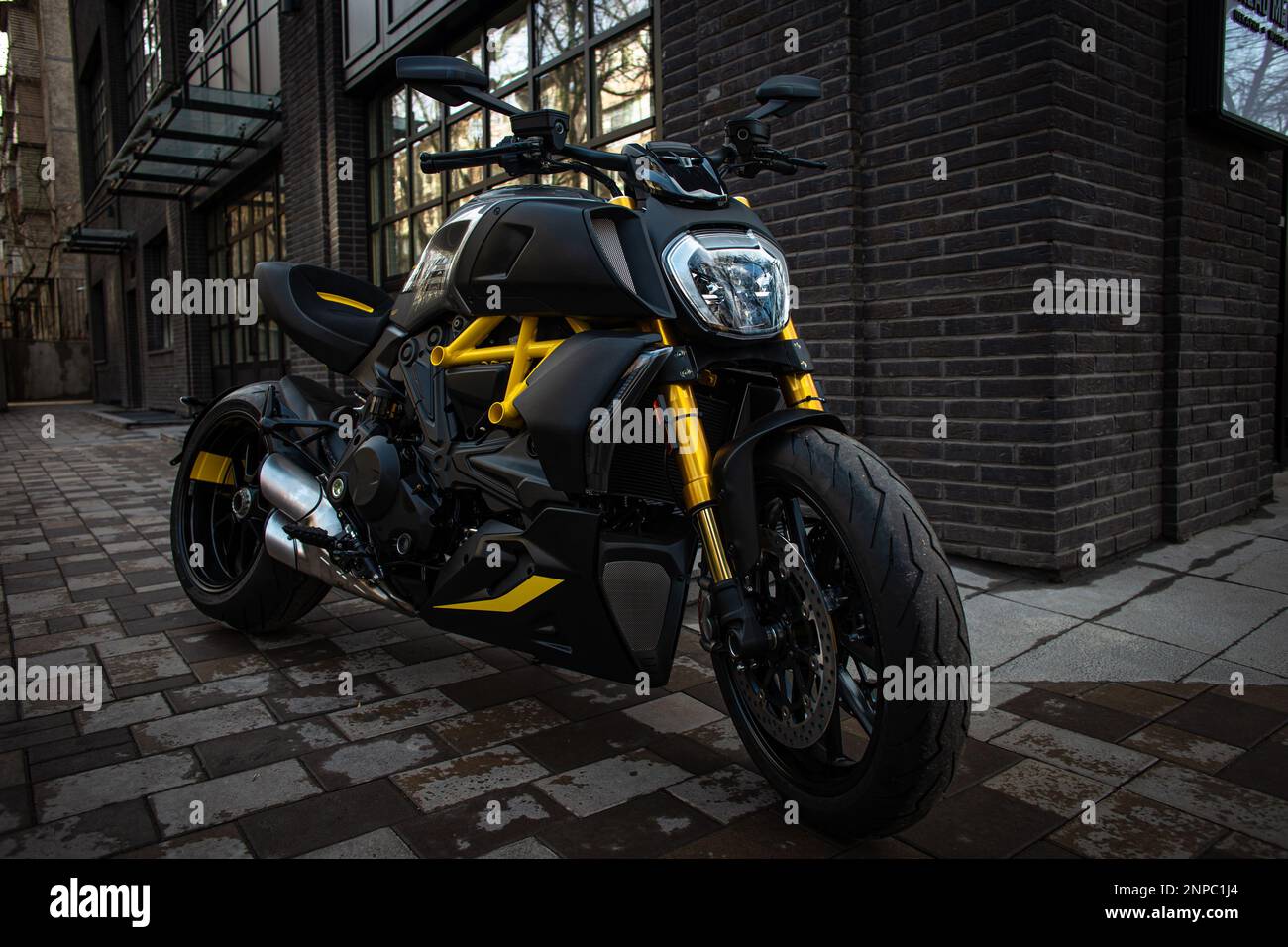 stylish black and yellow sports motorcycle on the city street Stock ...