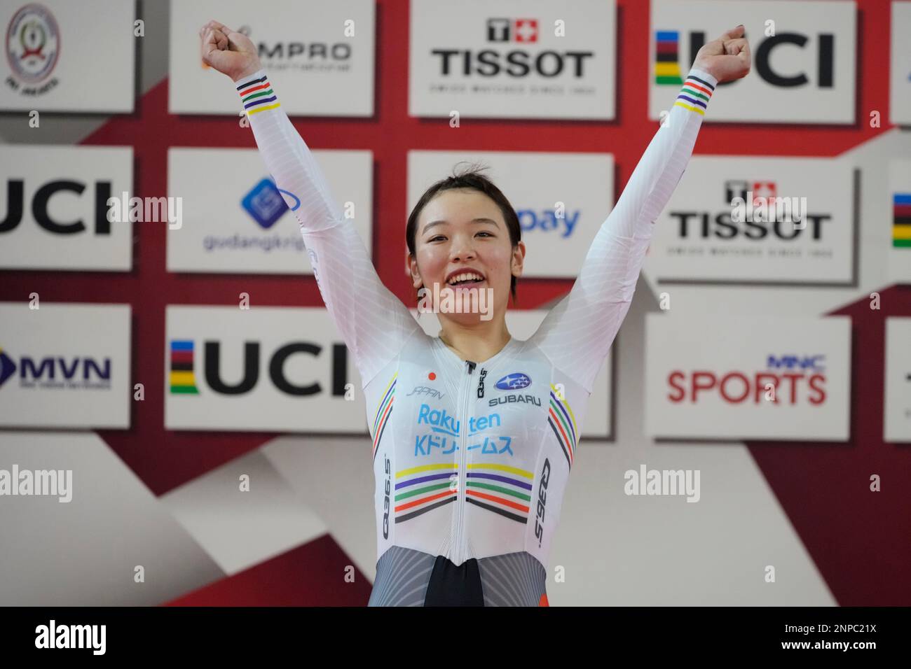Japan's Mina Sato celebrates on the podium after winning the women's ...