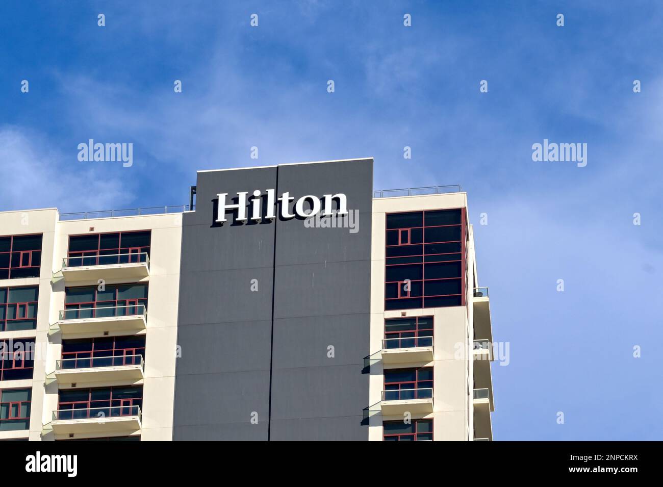 Austin, Texas, USA - February 2023: Sign on the outside of the Hilton ...