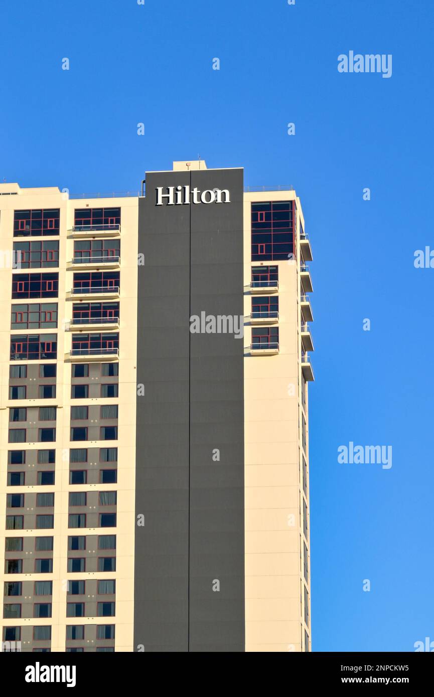 Austin, Texas, USA - February 2023: Sign on the outside of the Hilton ...