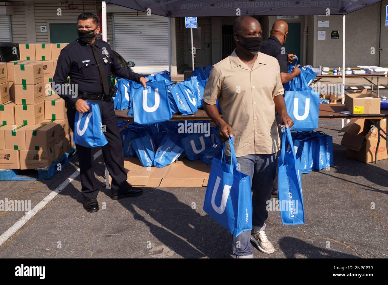Los Angeles Police Dept. South Bureau commander Al Labrada (left), Los ...