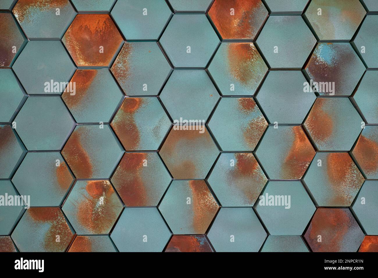 Hexagonal Tiles In Teal Blue With Rust Like Orange Marks Repeated