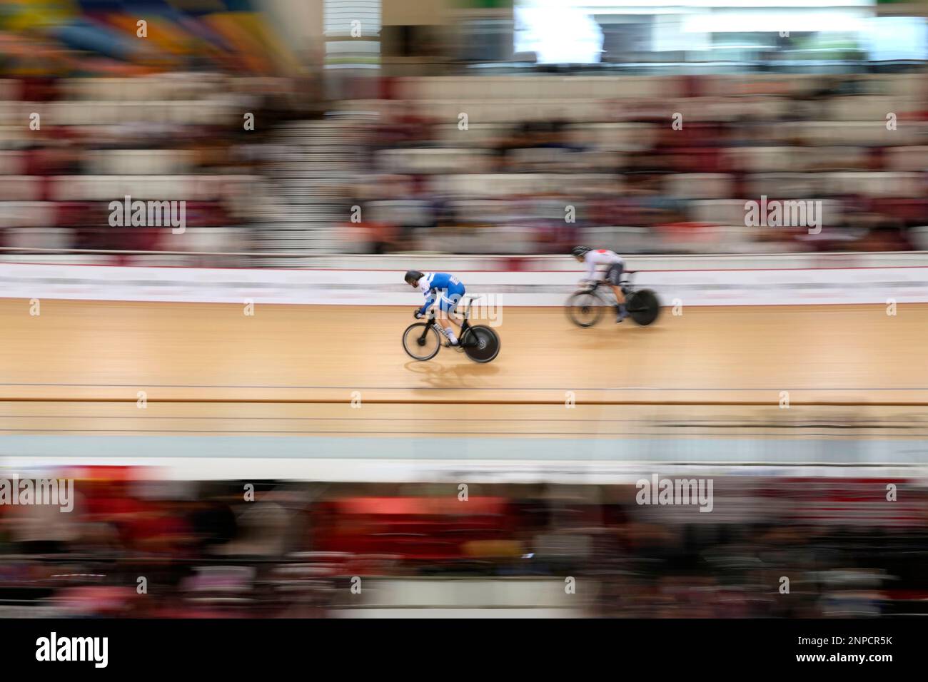 Israel's Mikhail Yakovlev, center, competes against Japan's Ota Kaiya ...