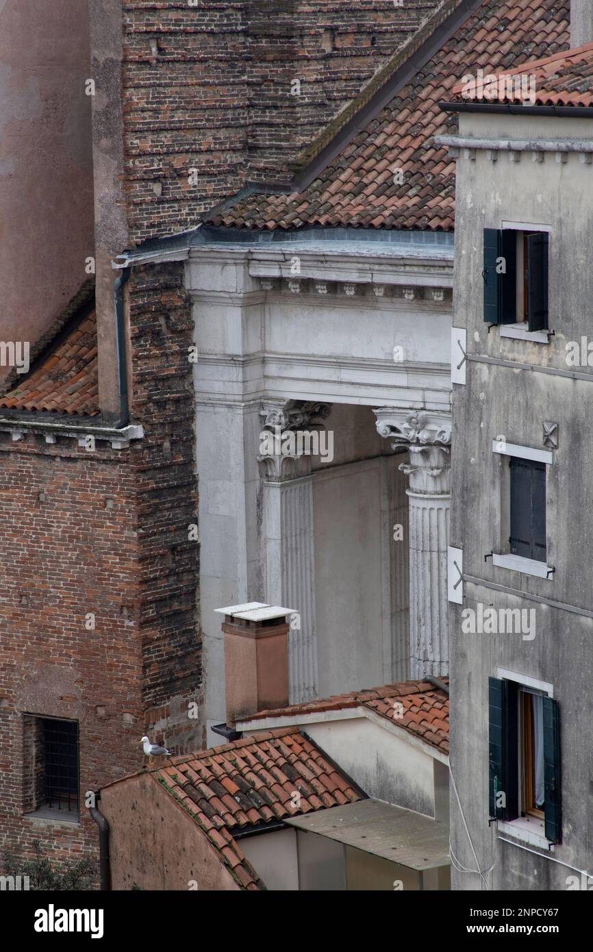Buildings and rooftops crowded together in the city of Venice, Italy ...