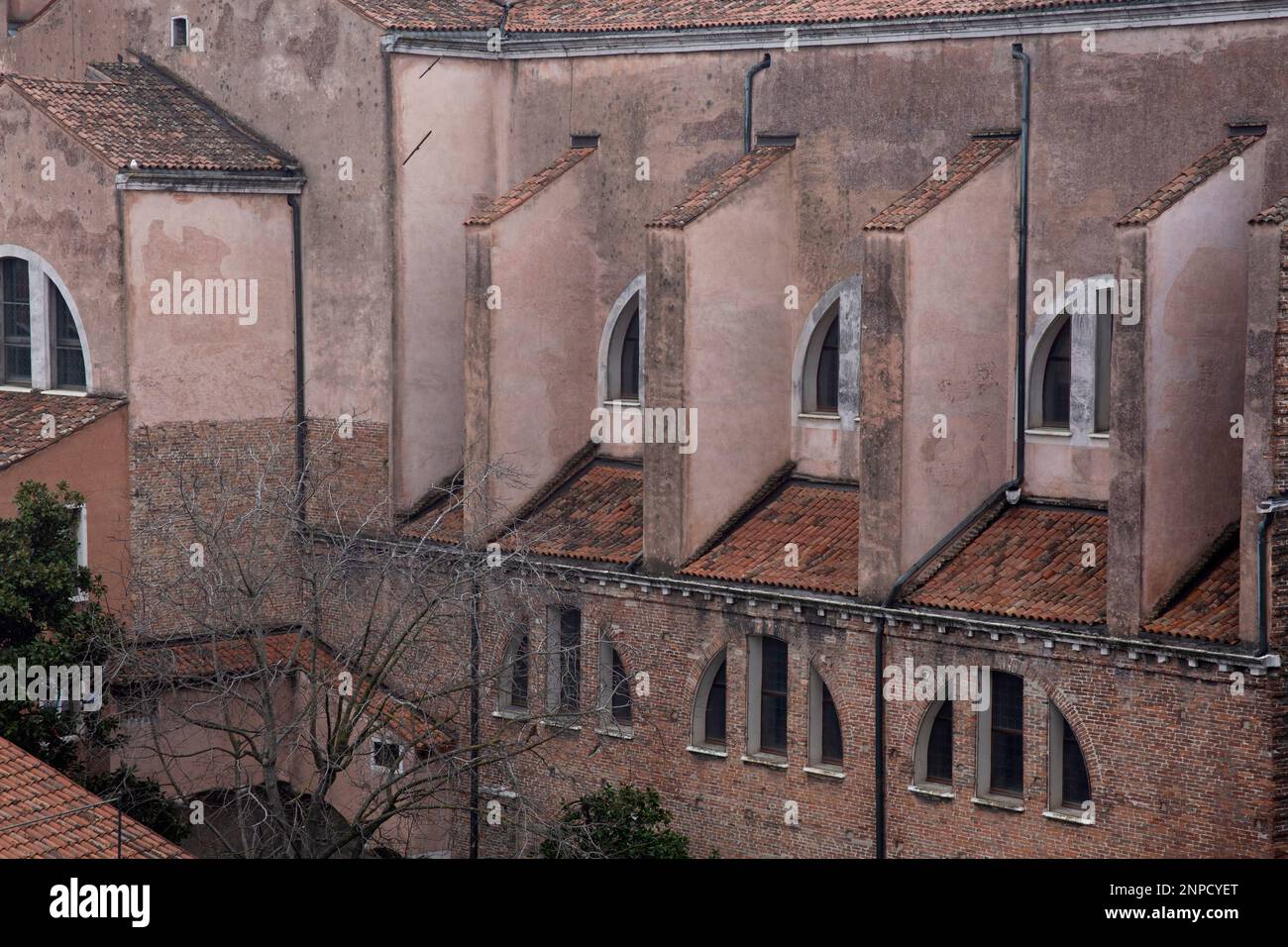 Buildings and rooftops crowded together in the city of Venice, Italy ...